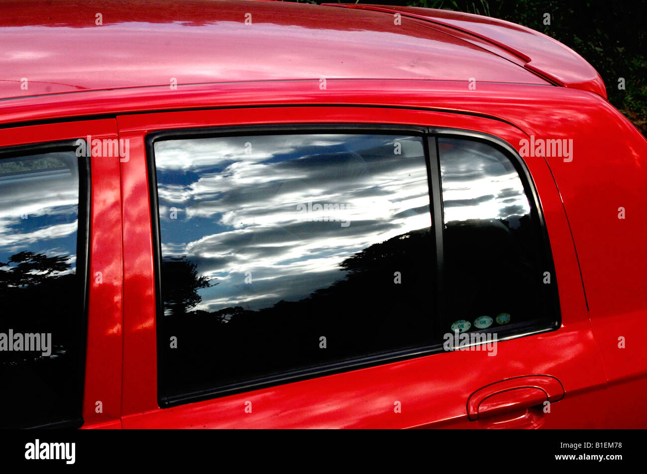 reflection of clouds in a car glass Stock Photo - Alamy