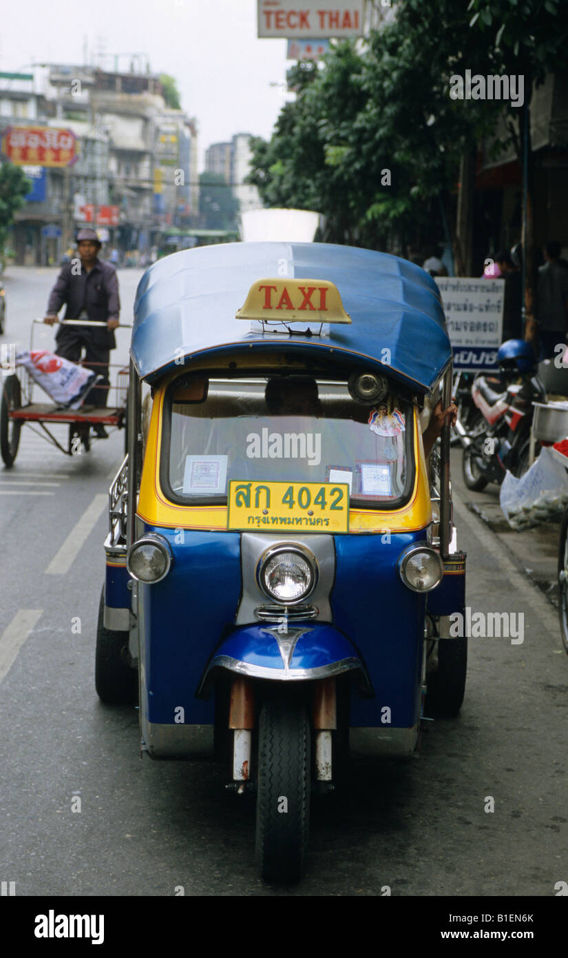 Blue and yellow Tuk tuk, Bangkok, Thailand Stock Photo - Alamy