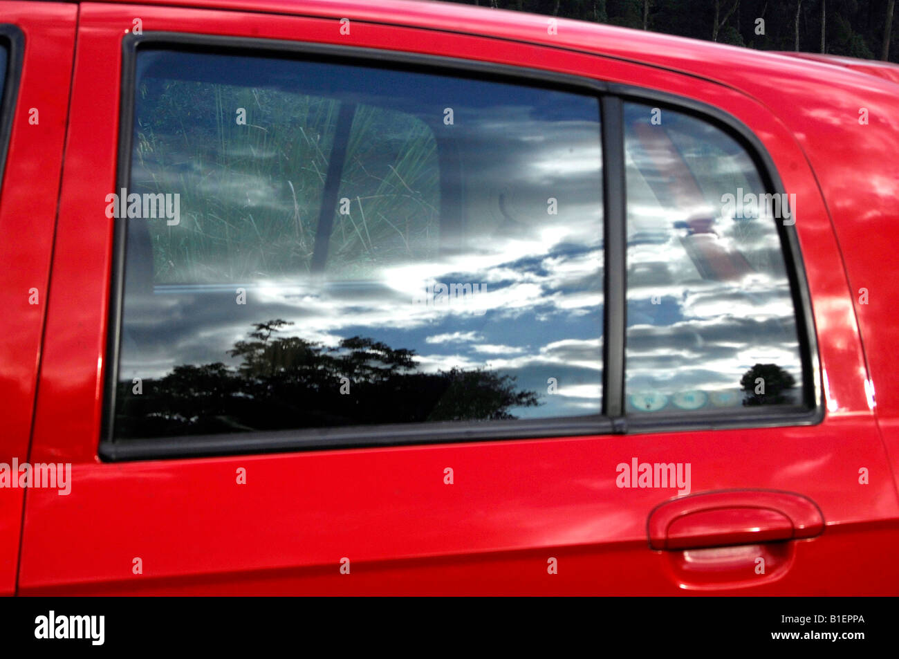 reflection of clouds in a car glass Stock Photo - Alamy