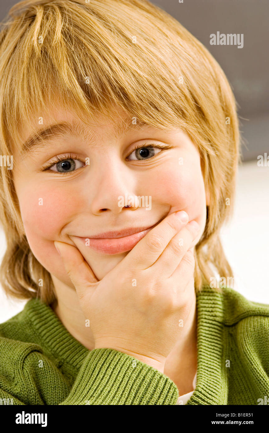 Close-up of a boy making a face Stock Photo - Alamy