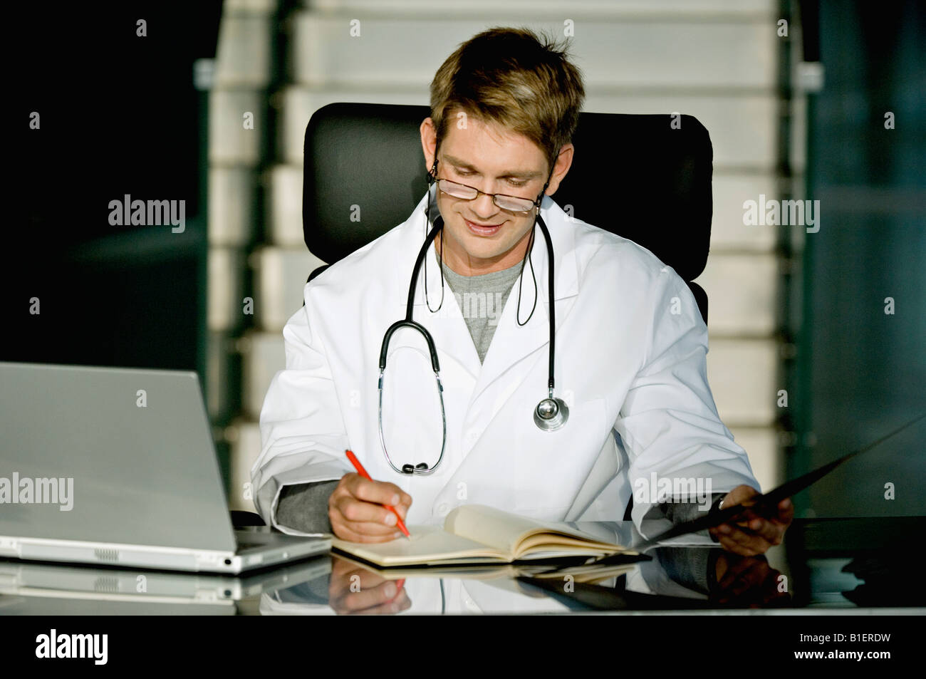 Caucasian male doctor writing hi-res stock photography and images - Alamy