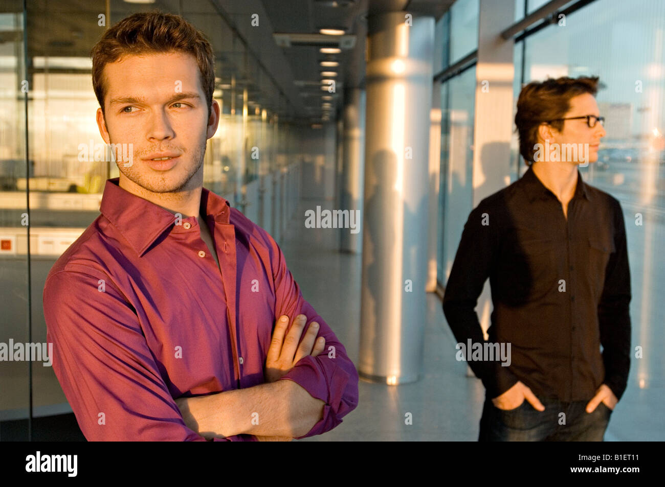 Businessman standing hands behind hi-res stock photography and images ...