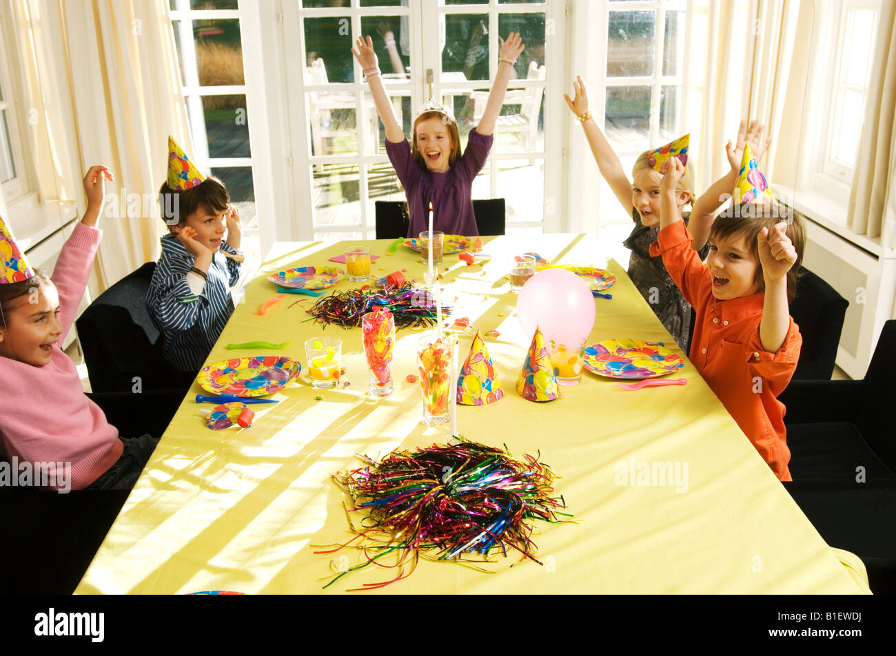 Children celebrating a birthday party Stock Photo - Alamy