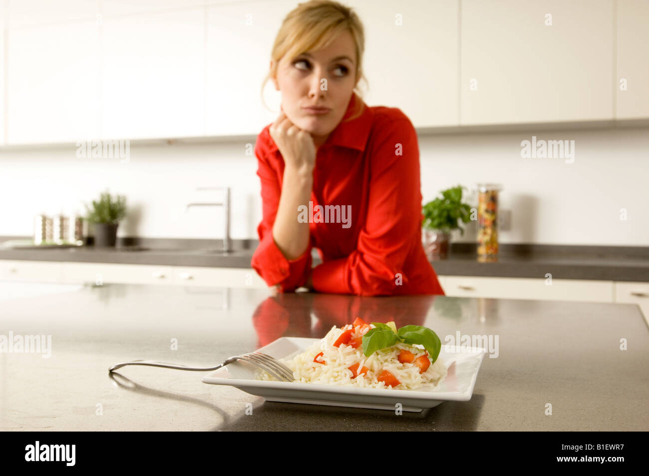 Woman Leaning Against A Counter High Resolution Stock Photography and ...