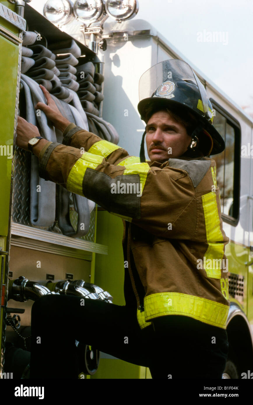 Fireman on this truck Stock Photo - Alamy