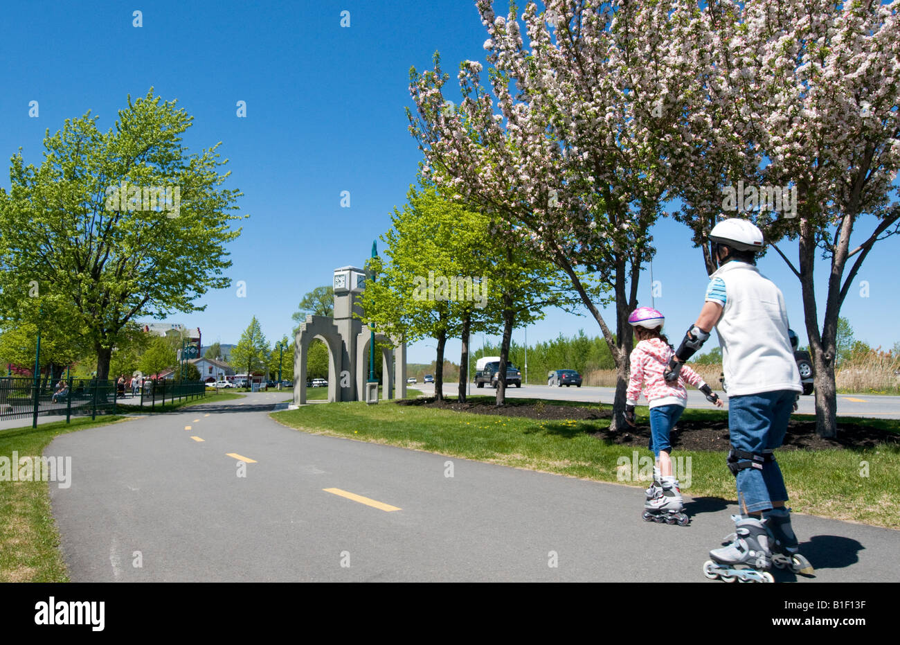 People skating on a bike path Eastern Townships Magog Stock Photo - Alamy