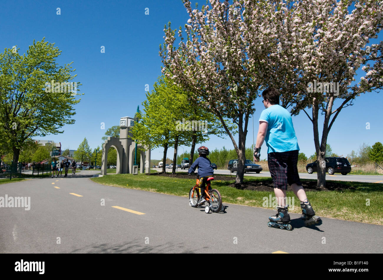 Children biking rollerblading hi-res stock photography and images - Alamy