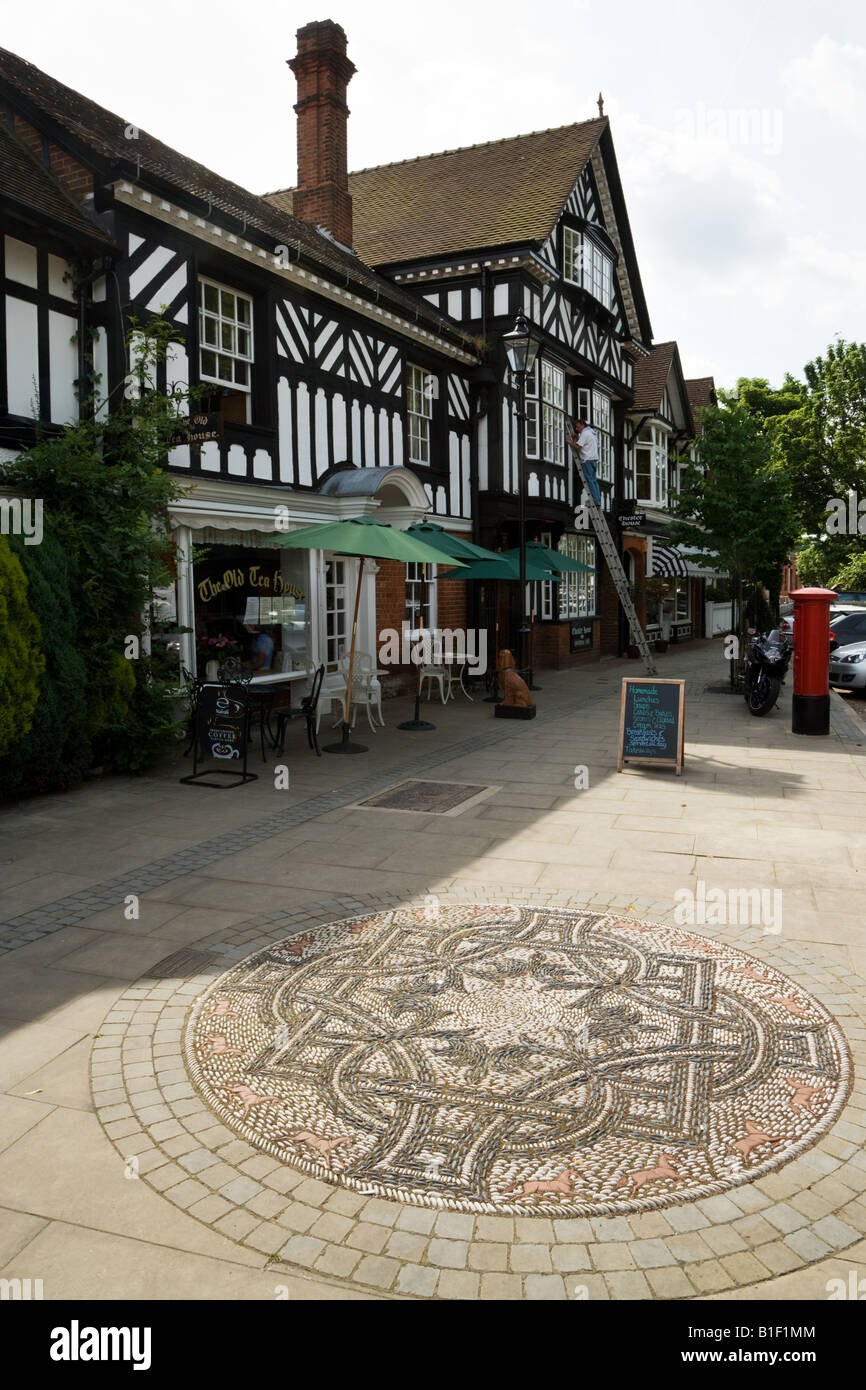 Street pavement decoration mosaic outside small shops in Beaconsfield ...