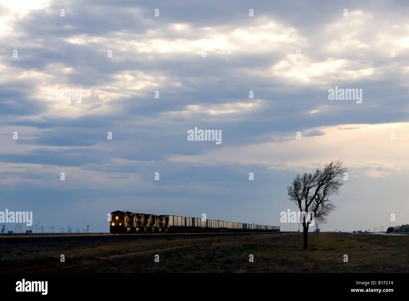 A long BNSF intermodal train rolls across the Texas Panhandle as storms ...