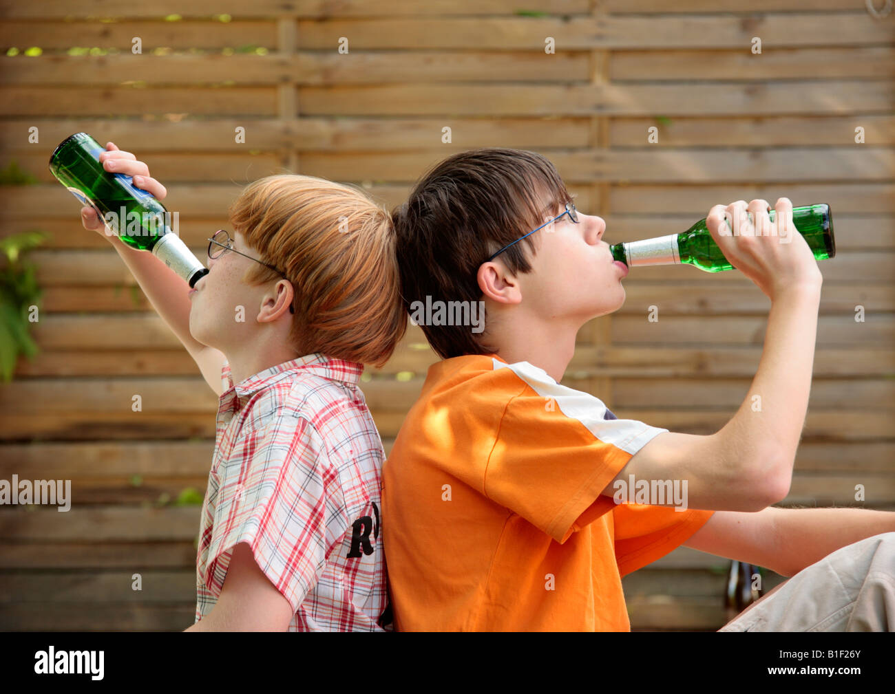 posed portrait of two young boys drinking beer Stock Photo - Alamy posed portrait of two young boys drinking beer Stock Photo - Alamy