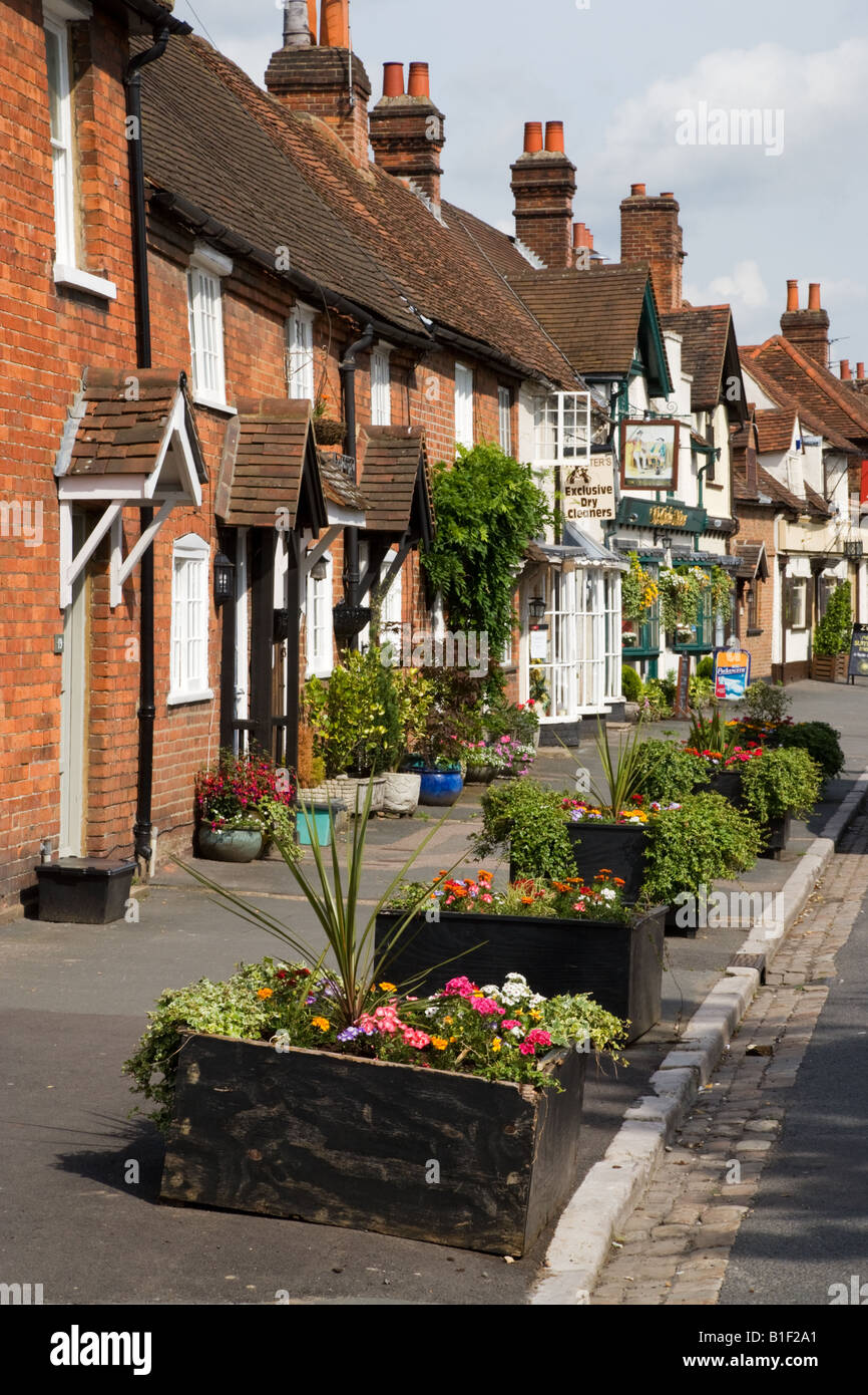 Shops and row of red brick houses hi-res stock photography and images ...