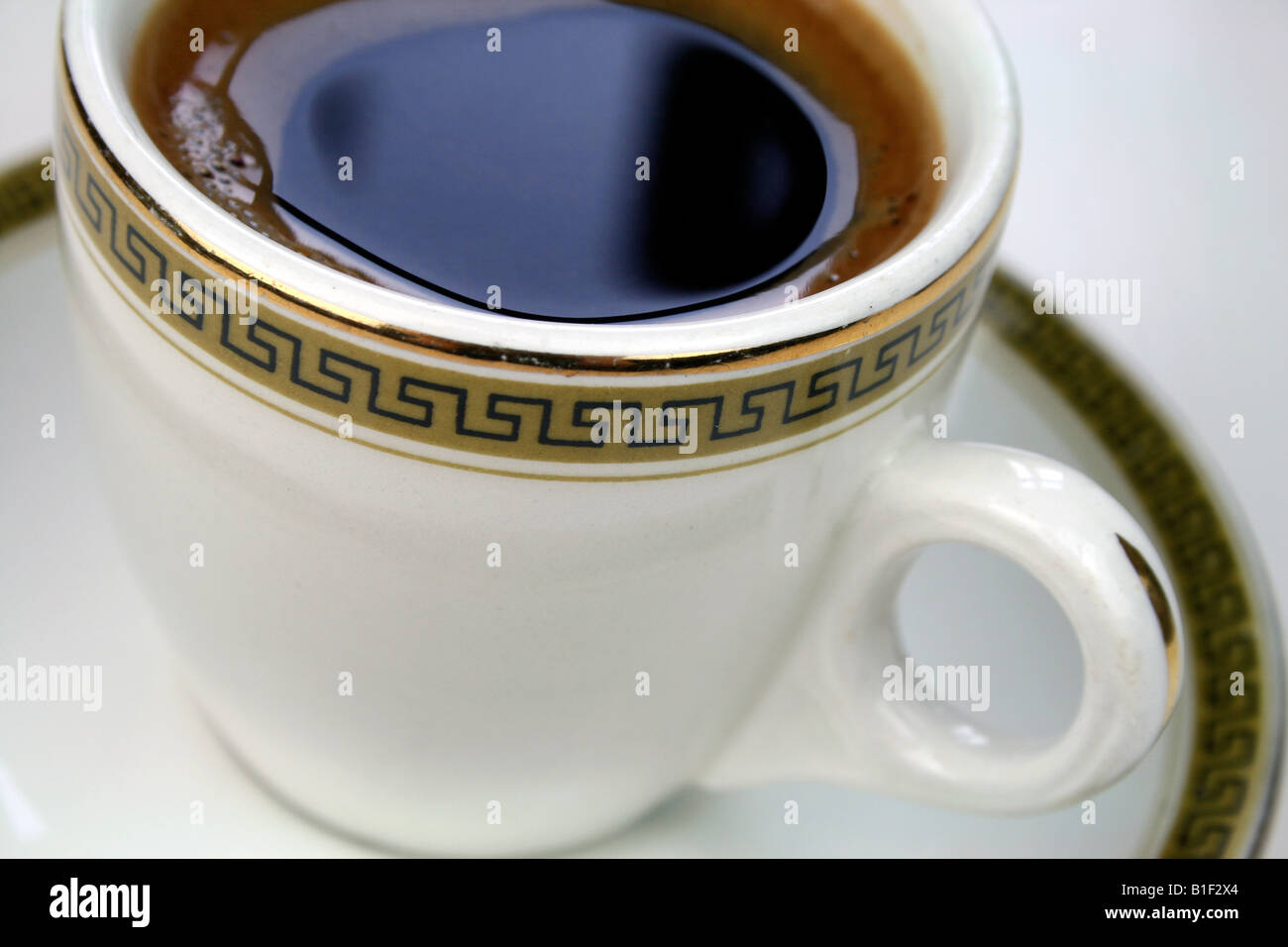 Espresso, black coffee in a small coffee cup Stock Photo - Alamy