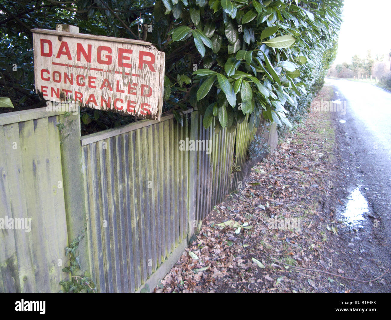 Concealed Entrances sign Stock Photo - Alamy