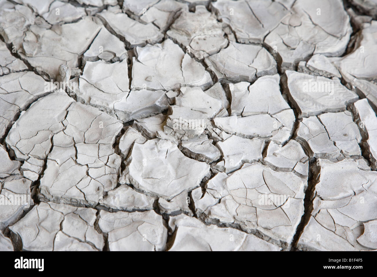 Dry parched and cracked soil Stock Photo - Alamy
