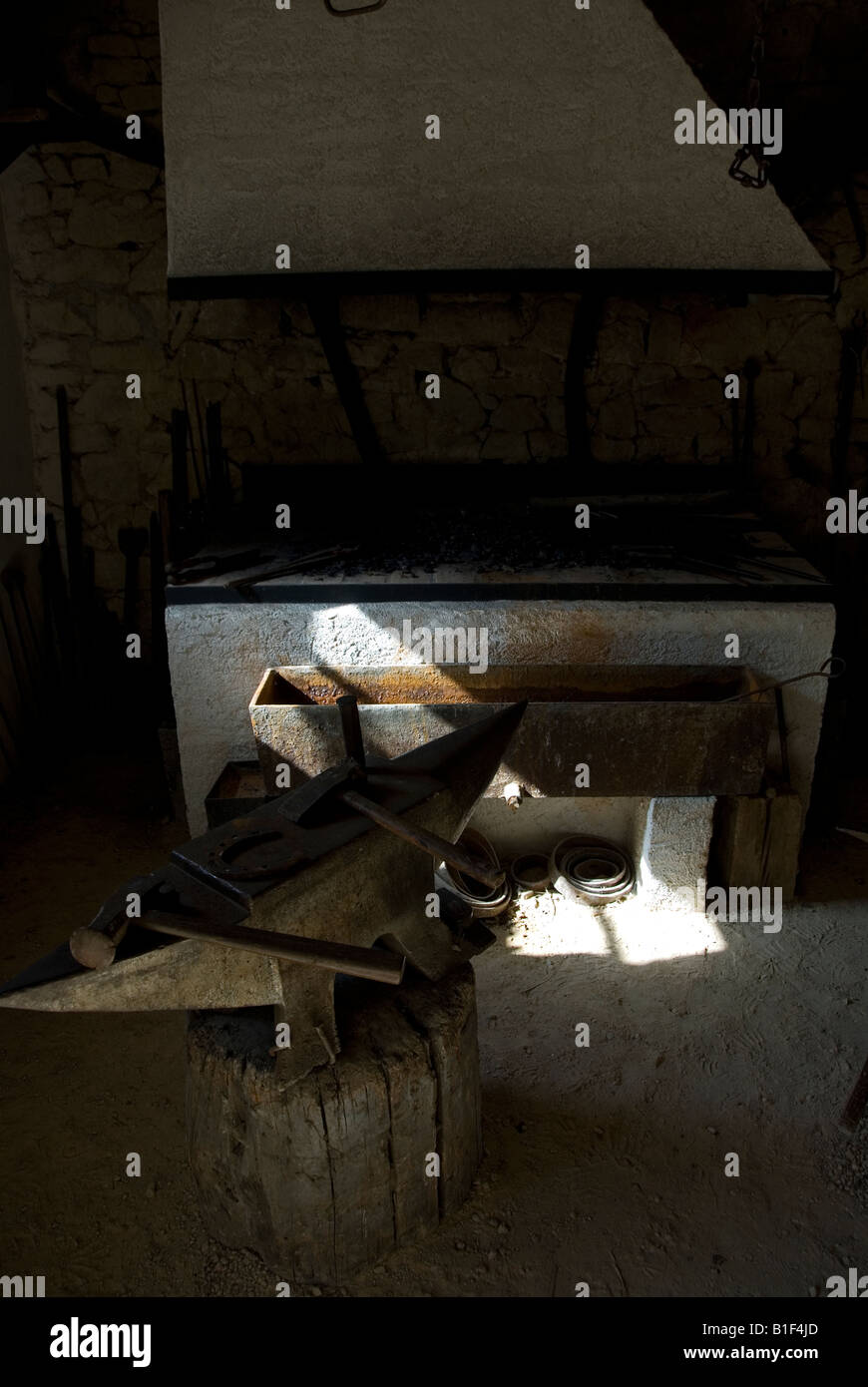 Stock photo the inside of the blacksmiths forge and anvil in the ...