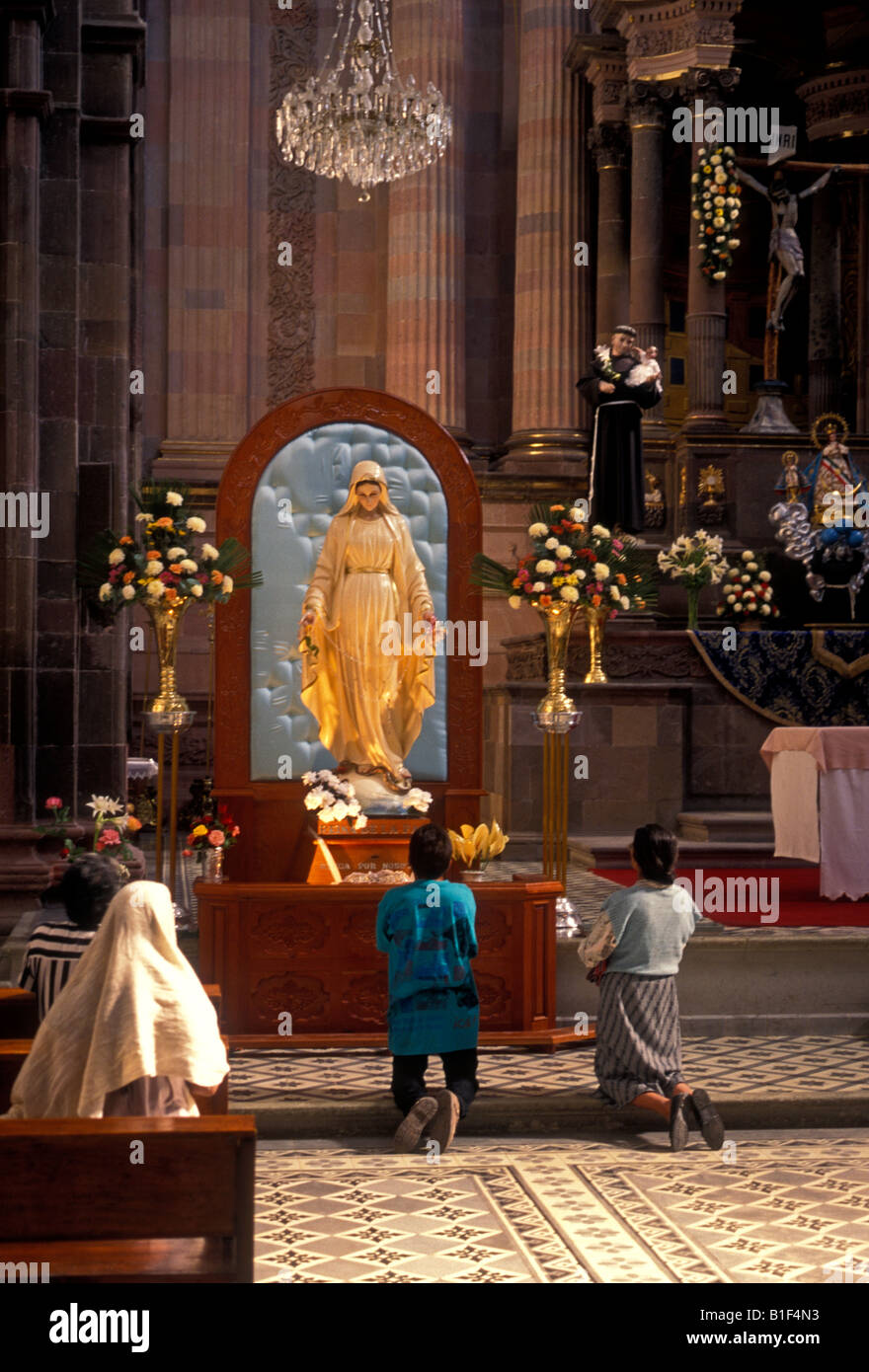 Mexican people, praying, altar, San Francisco Church, San Miguel de ...