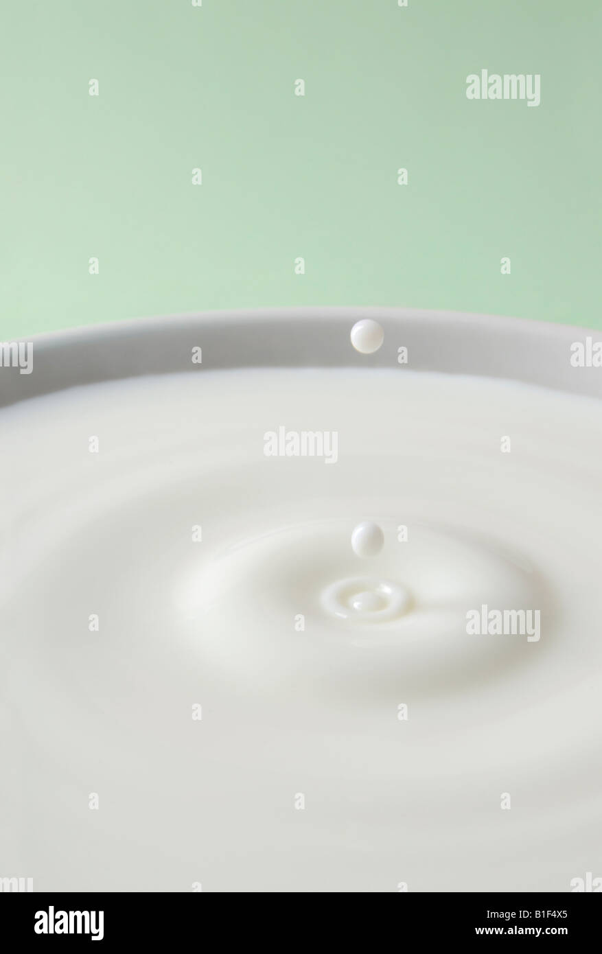 Milk splashing cup hi-res stock photography and images - Alamy