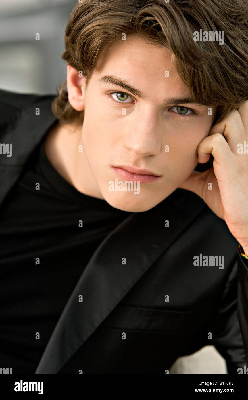 Portrait of a teenage boy thinking Stock Photo - Alamy