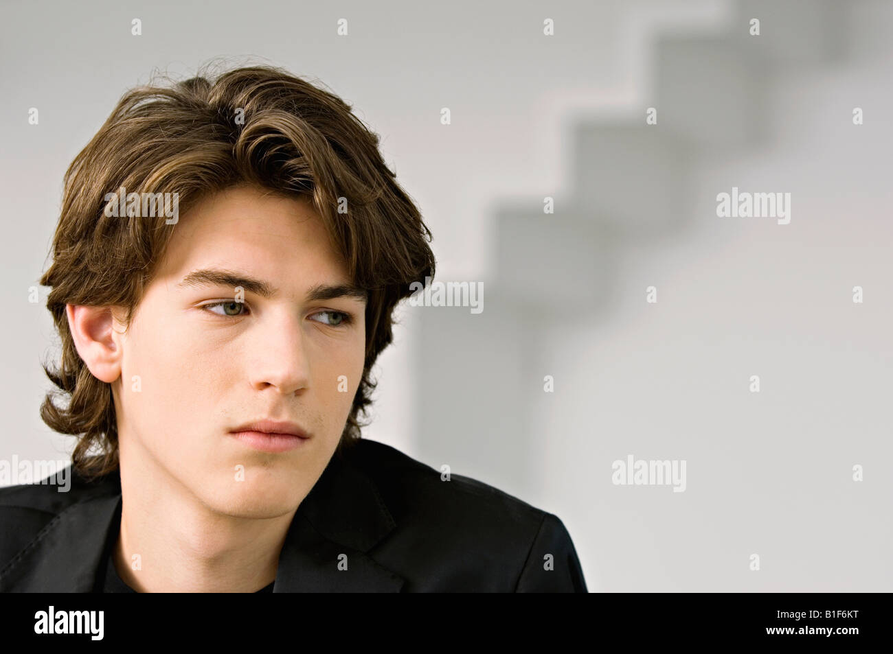 Close-up of a teenage boy thinking Stock Photo - Alamy