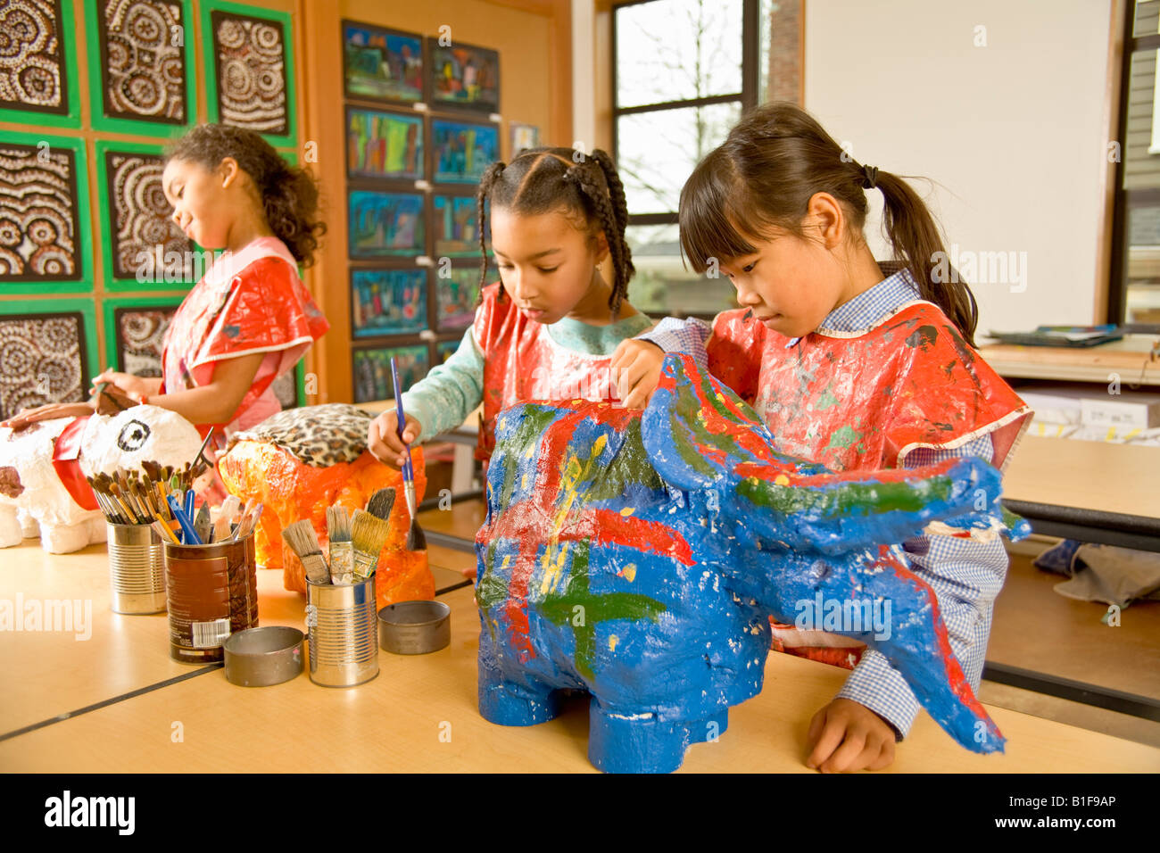 Multi ethnic girls making art project hi-res stock photography and ...