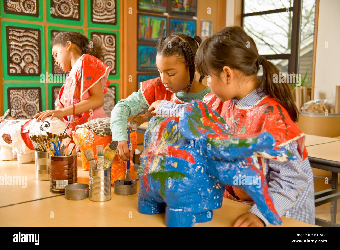 Multi ethnic girls making art projects hi-res stock photography and ...