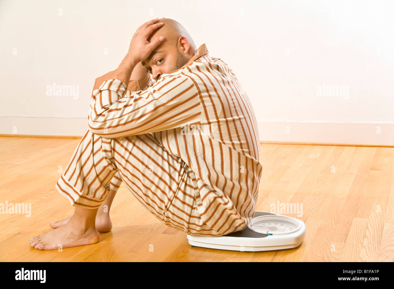 African overweight sad hi-res stock photography and images - Alamy