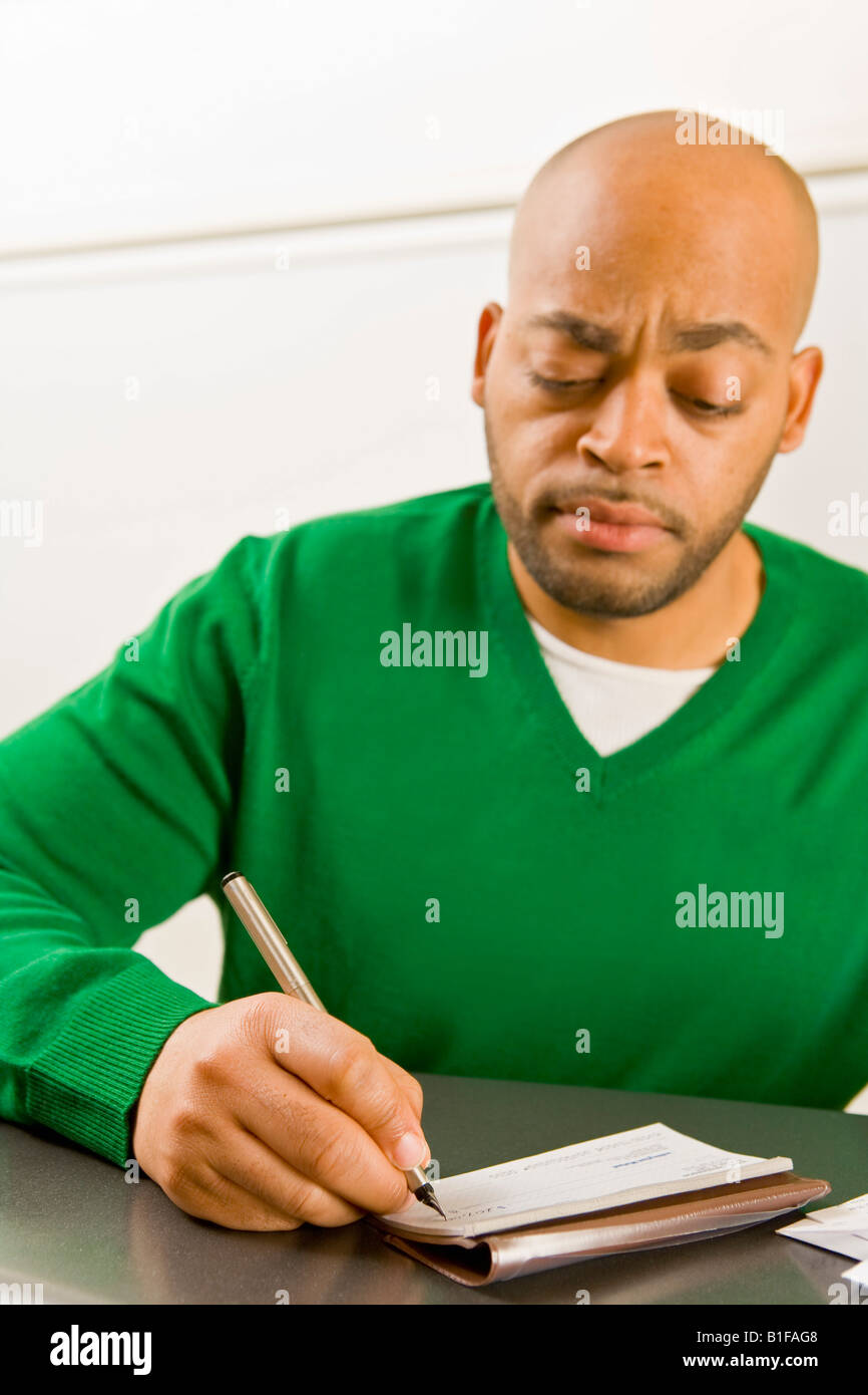 Writing check hi-res stock photography and images - Alamy