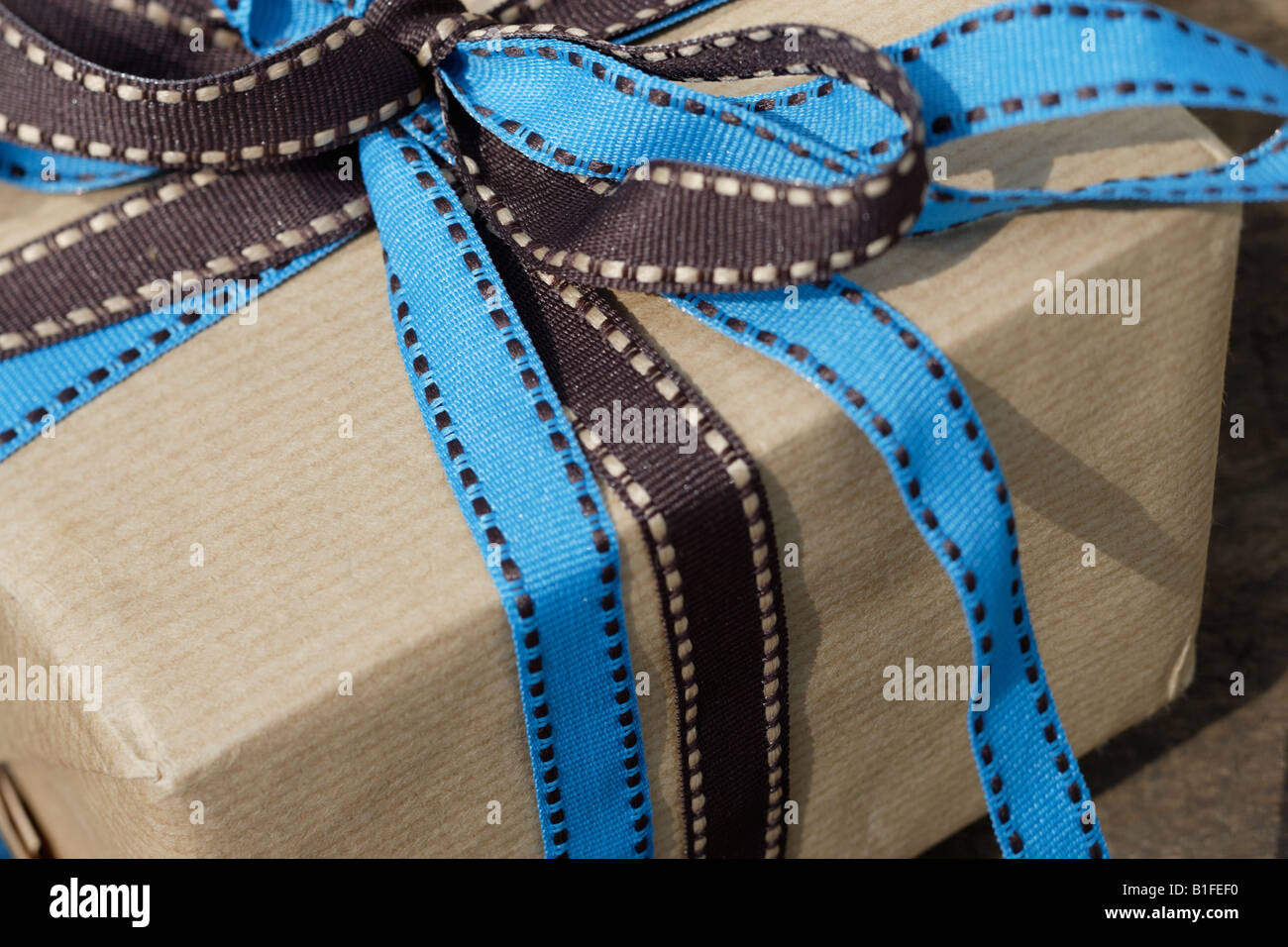 Ribbons around a parcel tied in a bow Stock Photo - Alamy