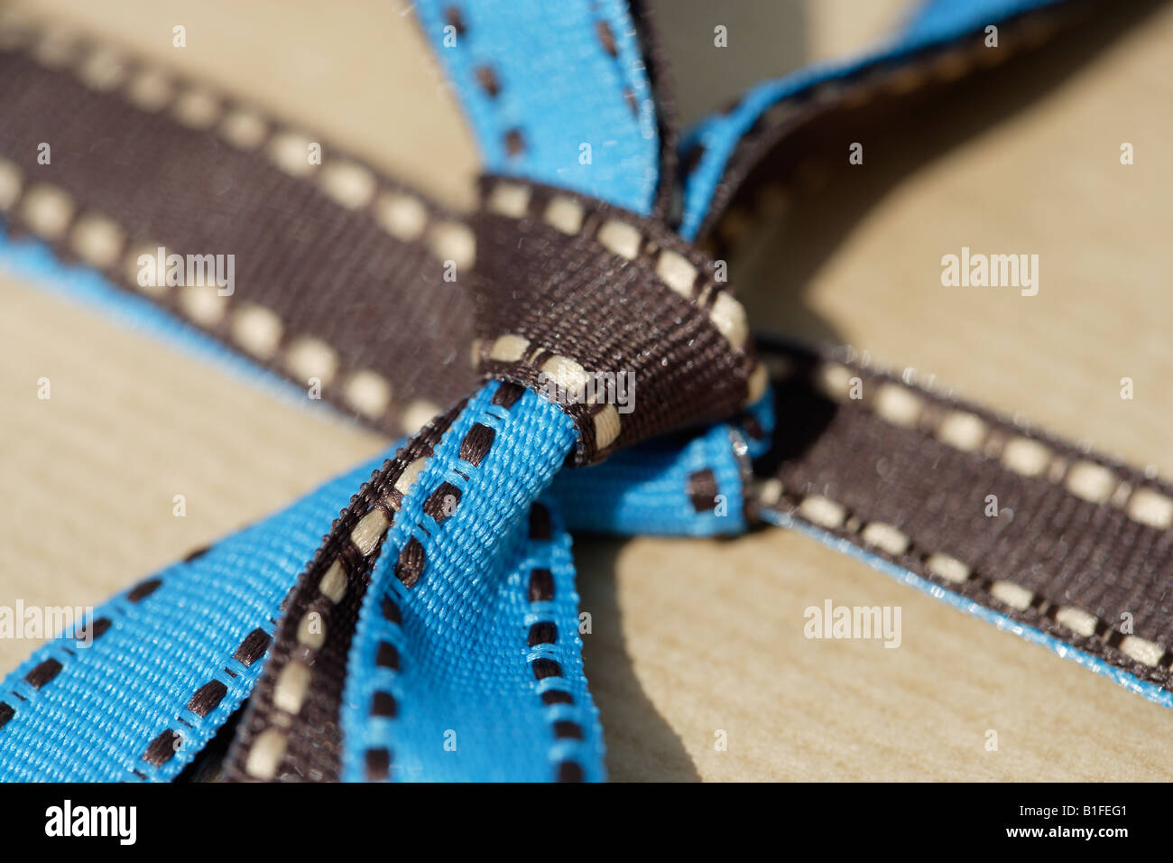 Ribbons around a parcel tied in a bow Stock Photo - Alamy