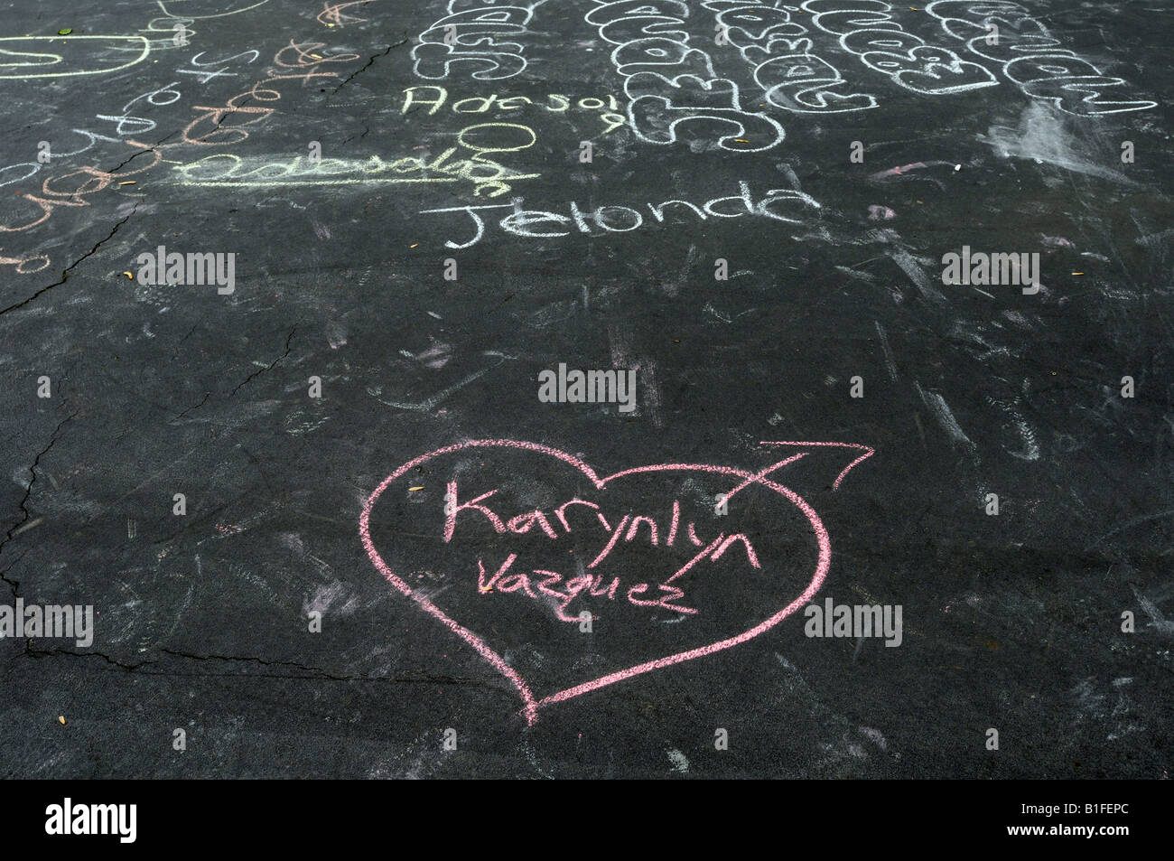 Chalk graffiti in a parking lot Stock Photo - Alamy