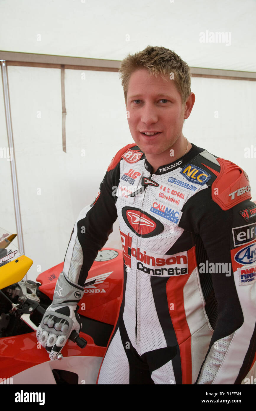 Gary Johnson beside his racing Honda in the paddock at Thruxton ...