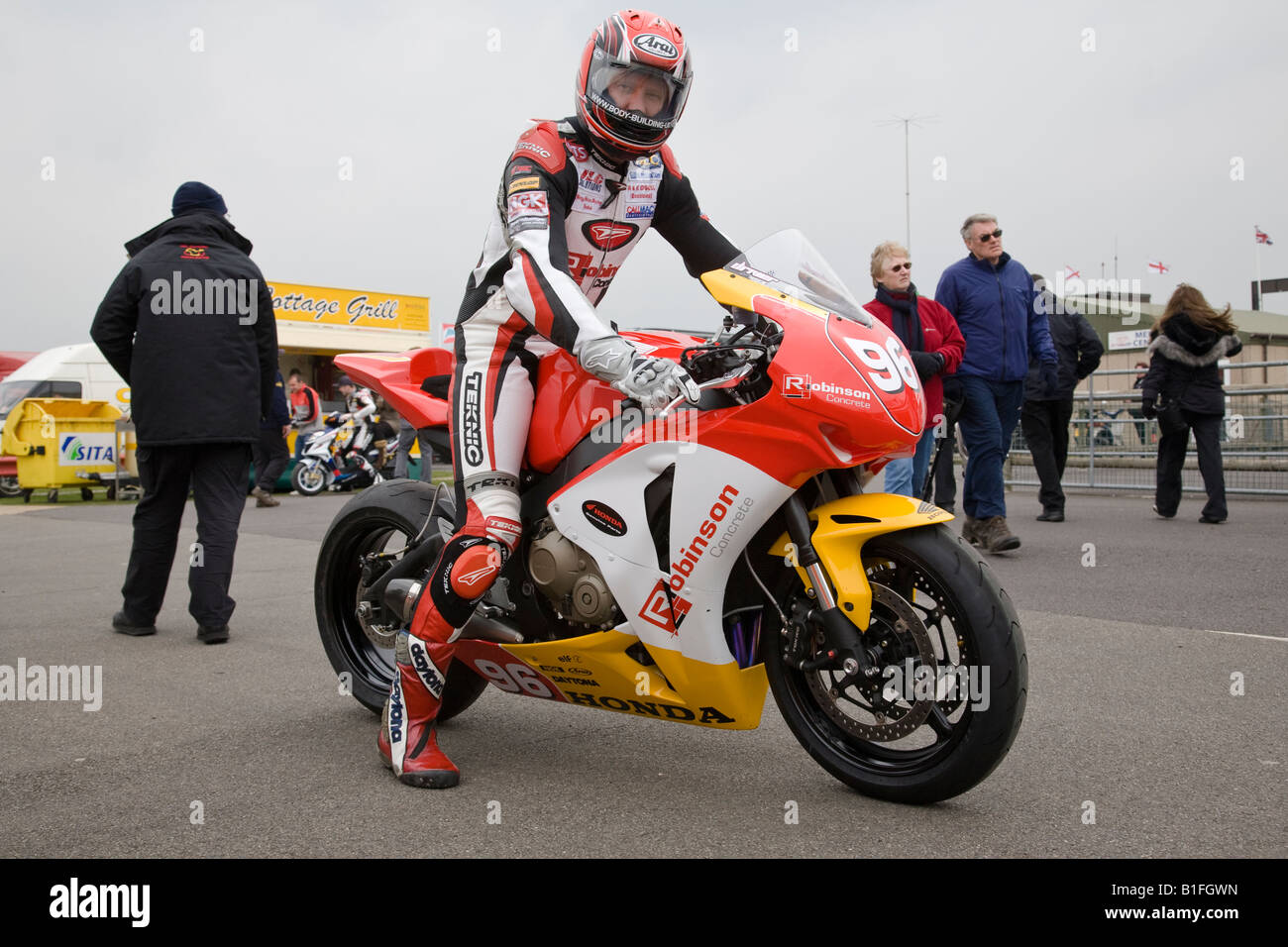 Gary Johnson prepares to leave the paddock at Thruxton on his Honda ...