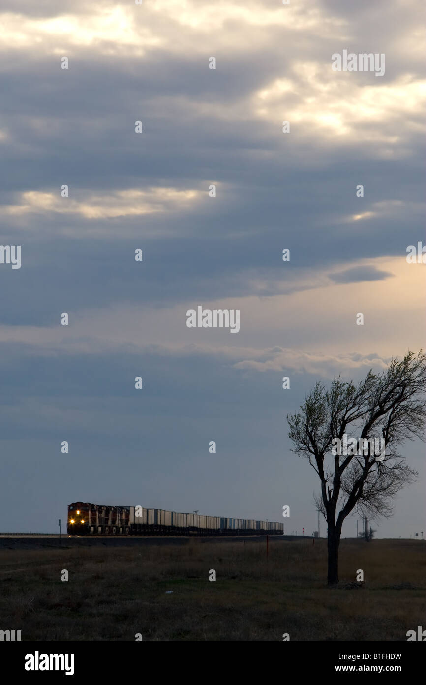 A long BNSF intermodal train rolls across the Texas Panhandle as storms ...