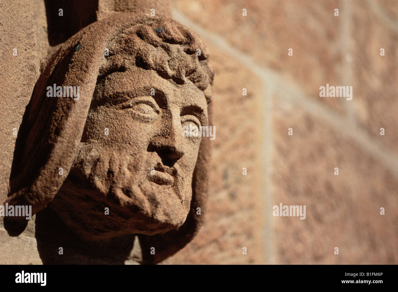 Stone Relief Of Face Stock Photo - Alamy
