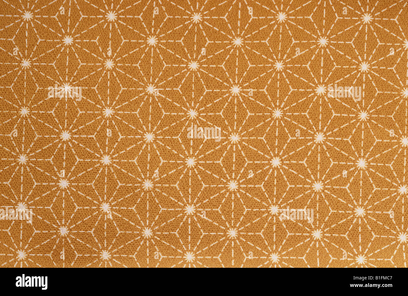 Star Pattern On Orange Fabric Stock Photo - Alamy