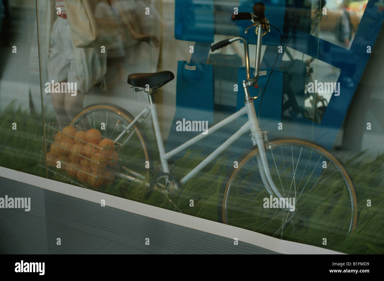 Bicycle On Window Display Stock Photo - Alamy