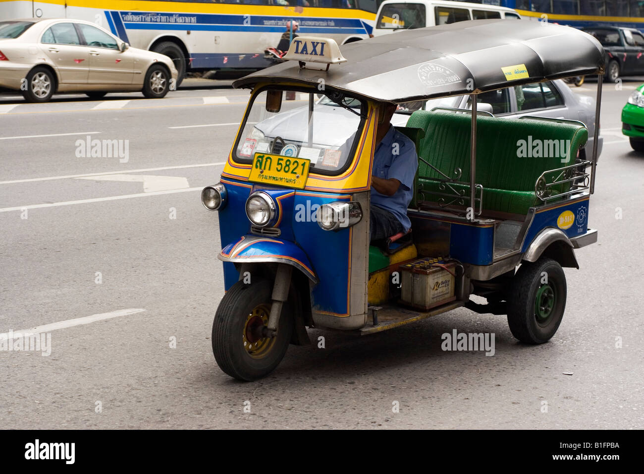 A tuk tuk in Bangkok, Thailand. Tuk Tuks or rickshaws are a cost ...