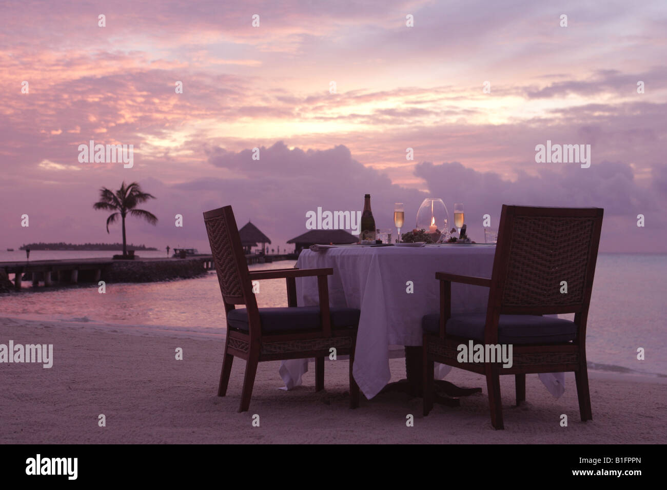 Dinner With The Setting Sun Stock Photo - Alamy