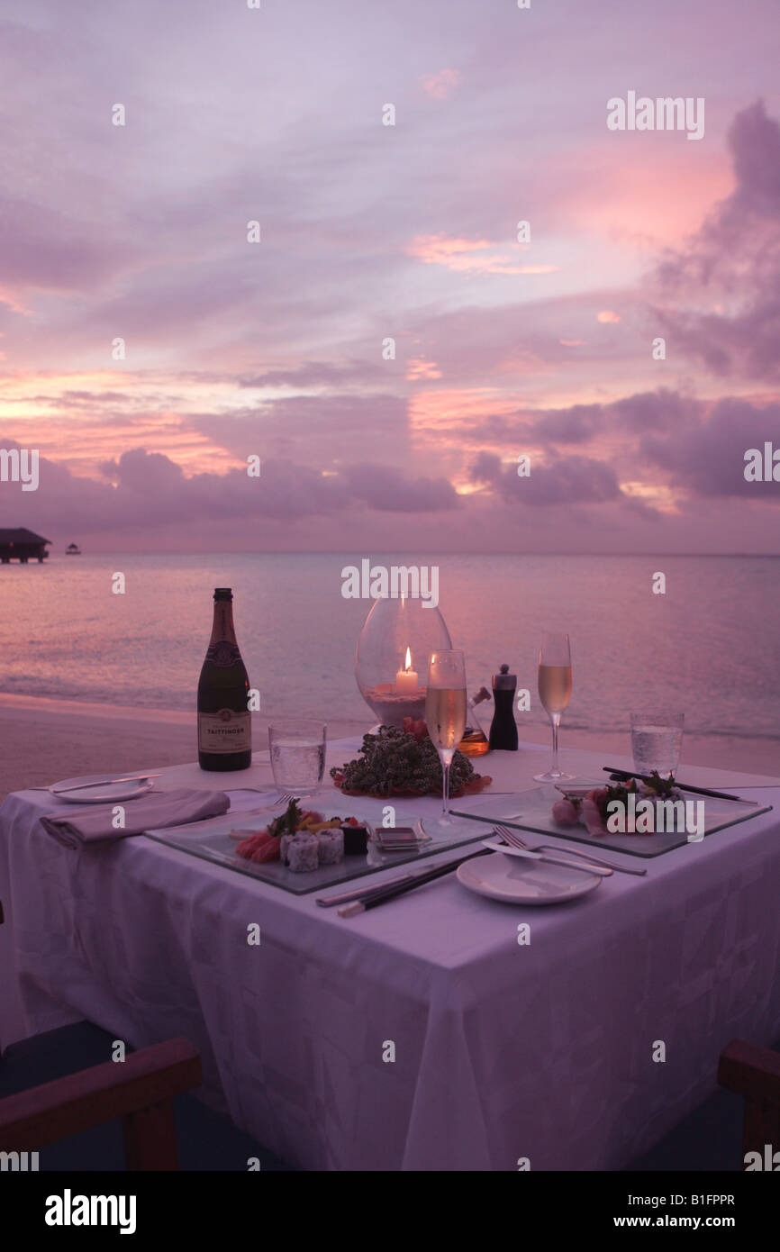 Dinner With The Setting Sun Stock Photo - Alamy