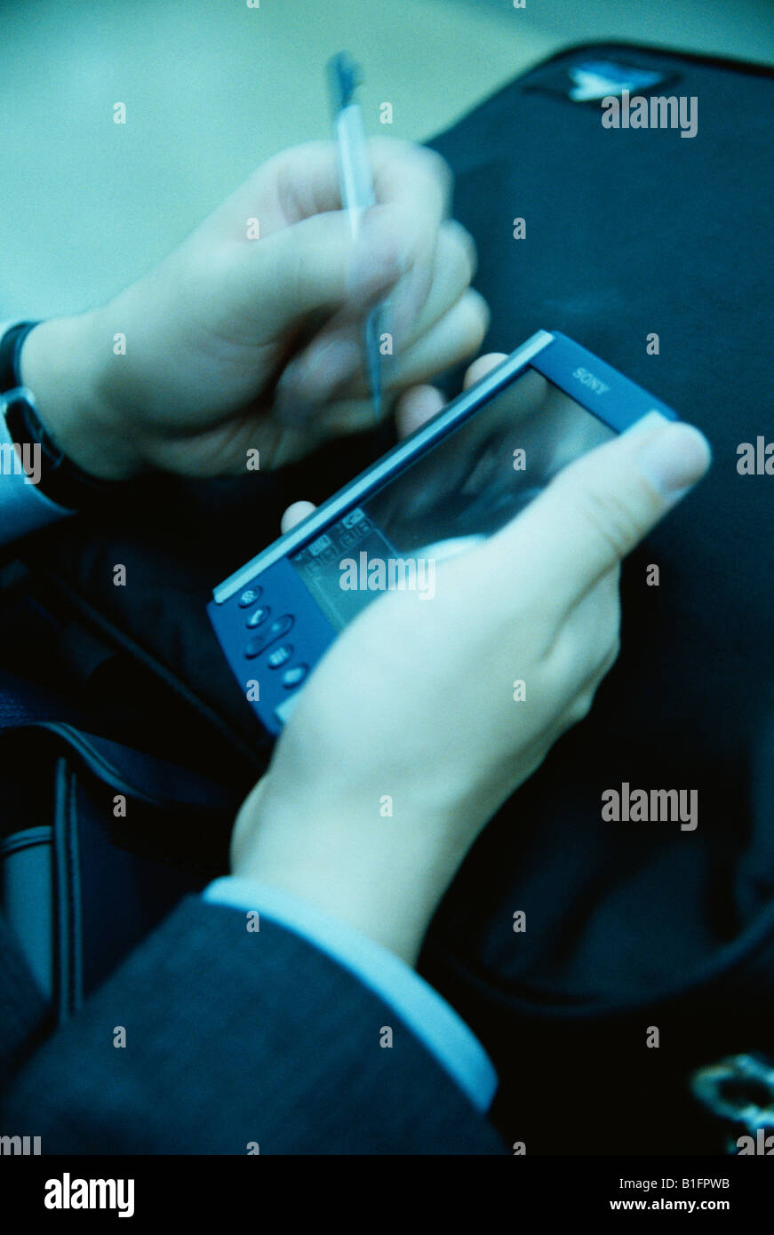 Handheld computers hi-res stock photography and images - Alamy