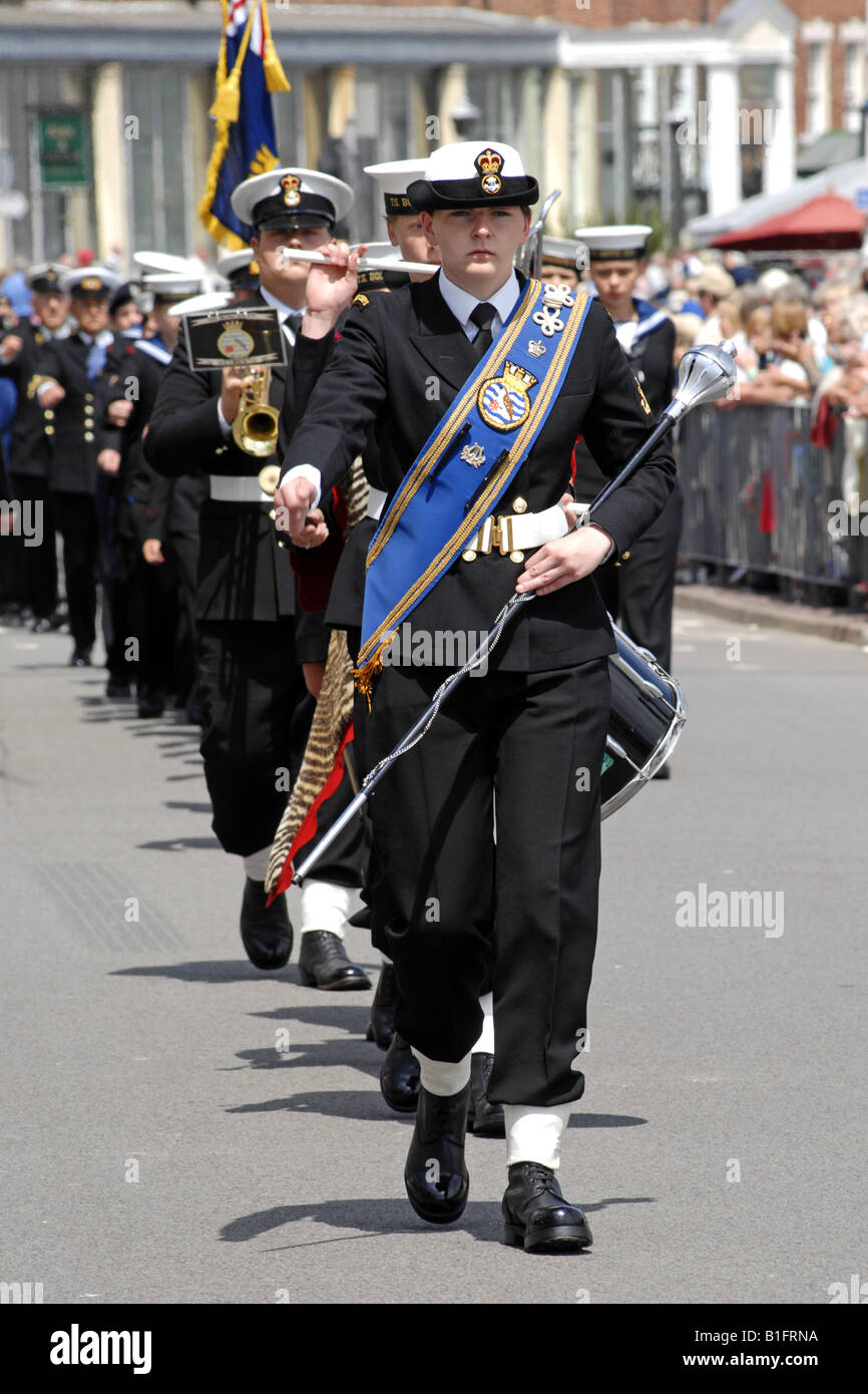 Men and Women of the Royal Navy march through the streets of Weymouth ...
