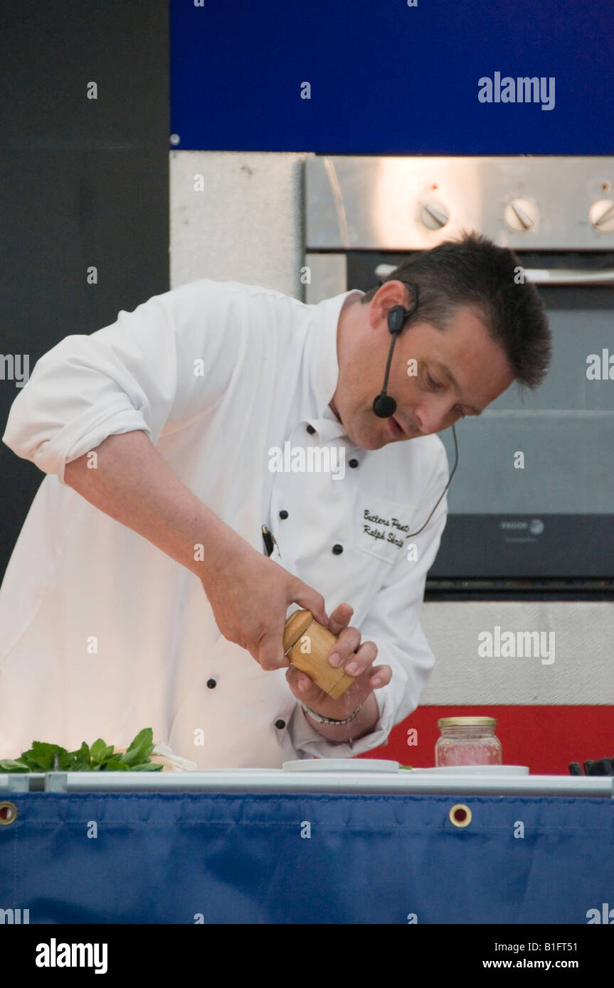 Chef giving a cookery demonstration at a Food Fair Derbyshire England ...