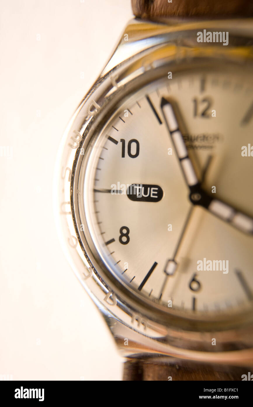 Close up of an analog swatch wrist watch on a white background Stock ...