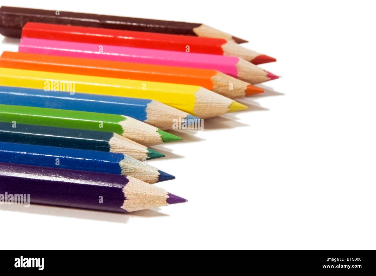 Several coloured crayons isolated over white Stock Photo - Alamy