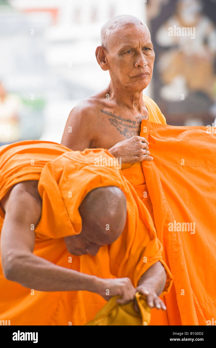 Orange Robed Buddhist Monks, Wat Phra Kaew, Bangkok Thailand Stock ...