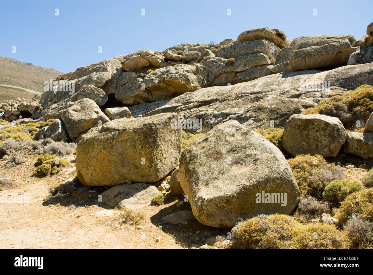 Coastal rock formations at Livada Beach Tinos Greece Stock Photo - Alamy