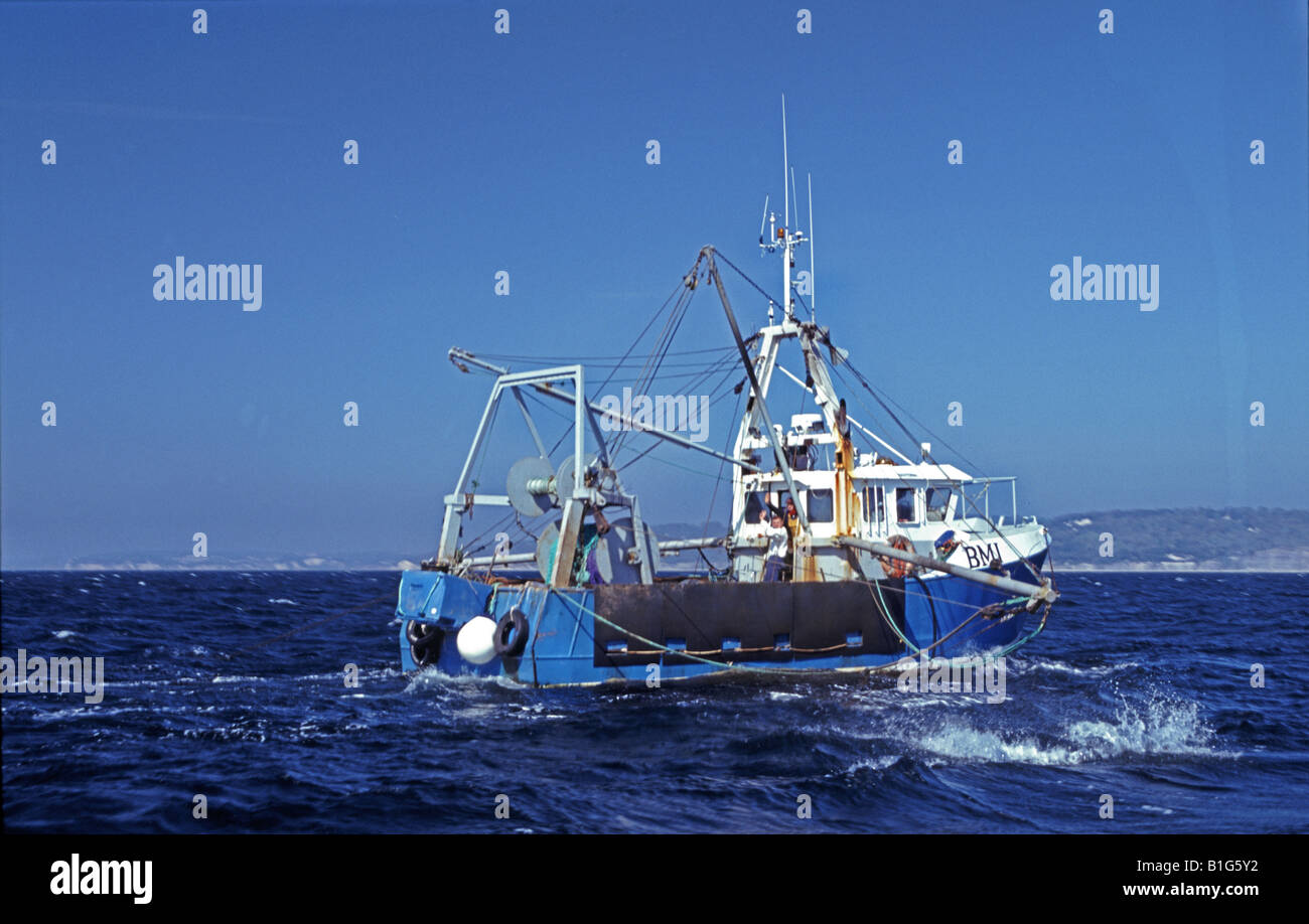 Beam trawler working as a scallop dredger, Lyme Bay, southwest England ...