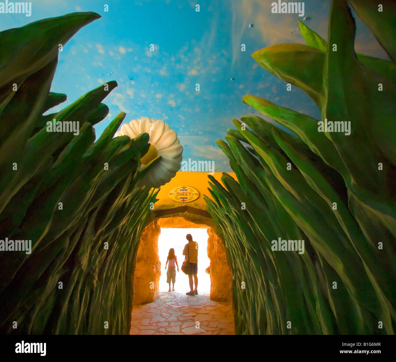 2 figures at the entrance to underground maze Stock Photo - Alamy