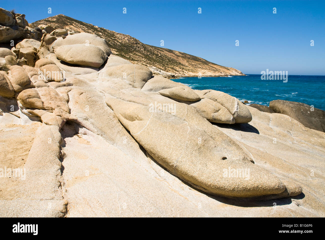 Coastal rock formations at Livada Beach Tinos Greece Stock Photo - Alamy