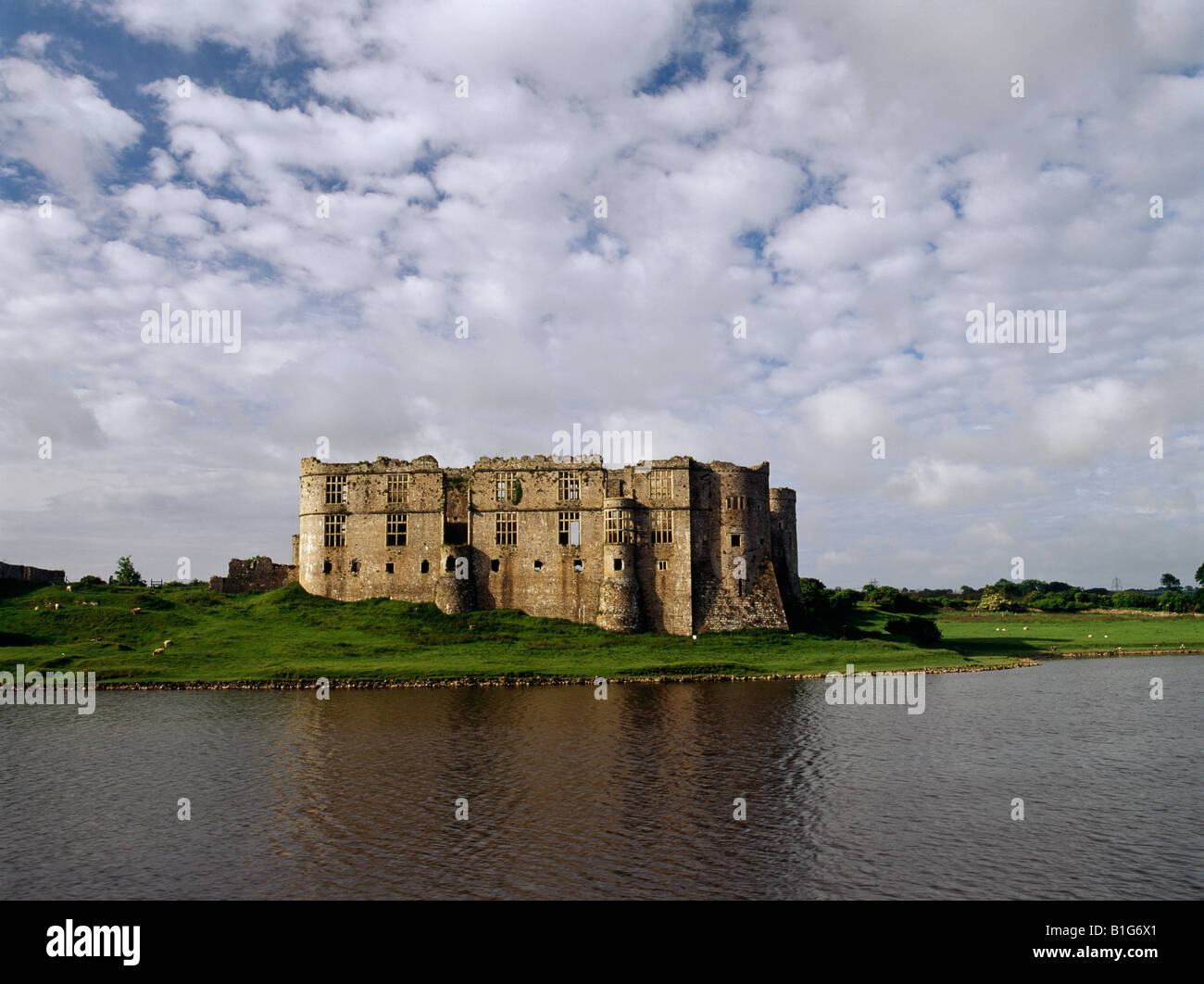View of Carew Castle across Lake Stock Photo - Alamy